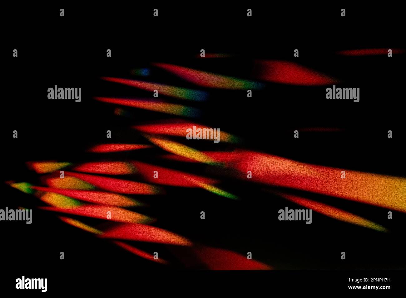 Red and green Prism Rainbow refraction Specs on black Background ...