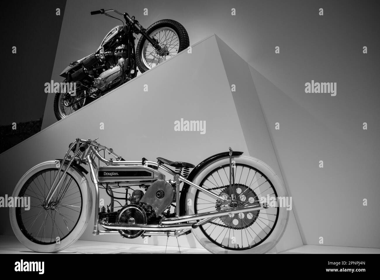 Motorcycles on display at motorcycle expo - photographed in black and ...