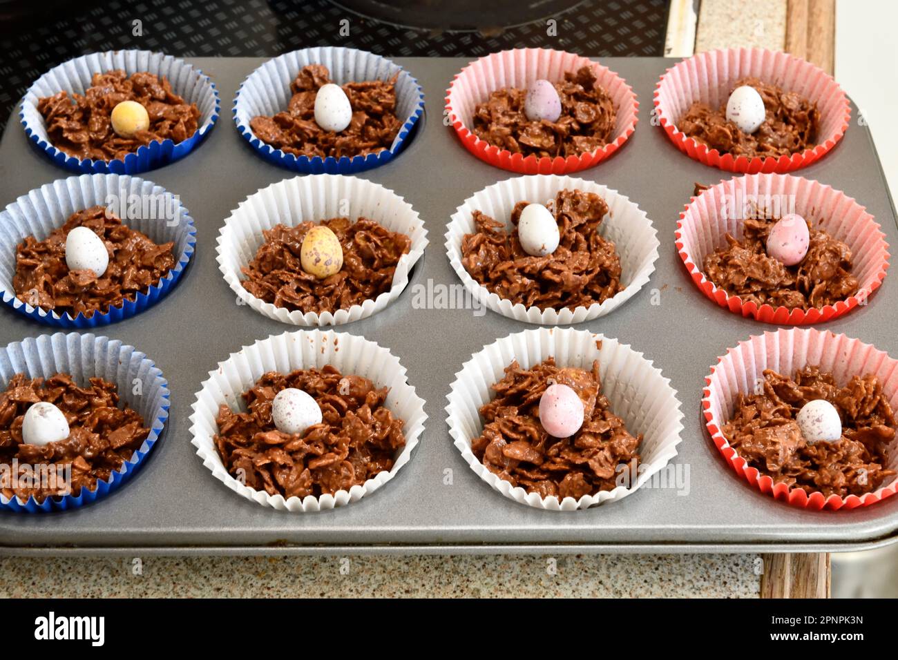 Chocolate Haystacks in a Muffin Tin for Easter Time Stock Photo - Alamy