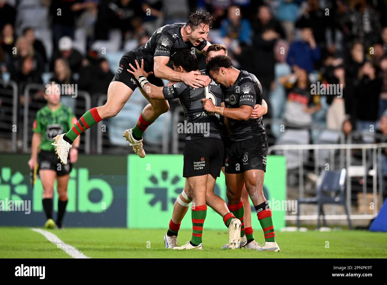Isaiah Tass of the Rabbitohs (right) celebrates with teammaters after ...