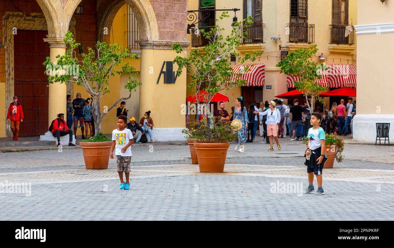 Havana, Cuba - April 12, 2023: Cuban children playing in Plaza Vieja ...