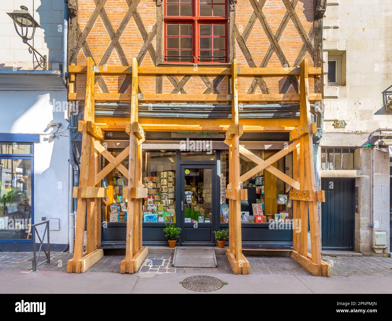 Old shop building supported by timber structure for repairs, Tours ...