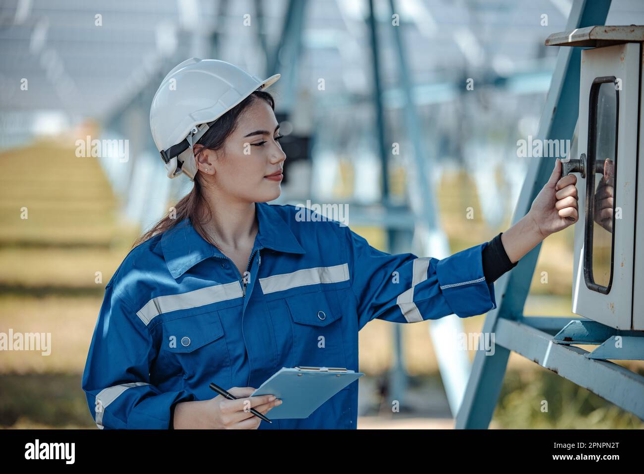 Solar electric installer and practitioner inspect electrical systems ...