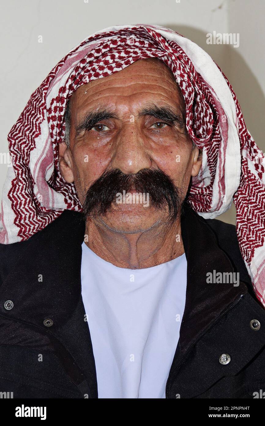 A Yazidi man is seen attending the celebration of Red Wednesday holiday ...