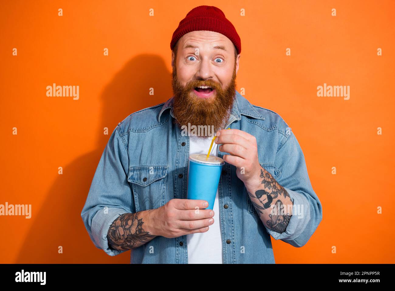 Photo of excited funky guy dressed denim jacket enjoying sparkling ...