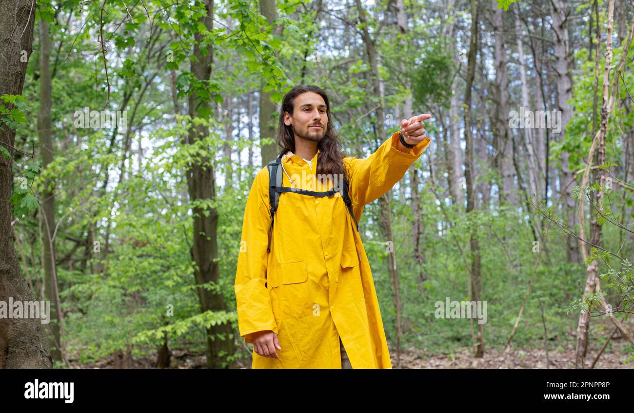 Man in forest Stock Photo - Alamy
