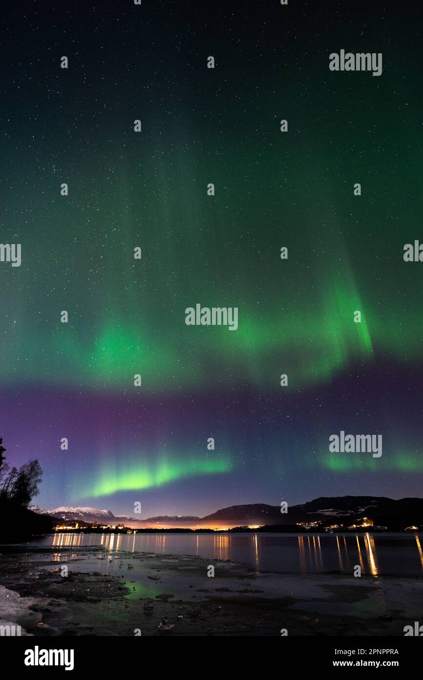 A spectacular display of the northern lights aurora radiates across the ...