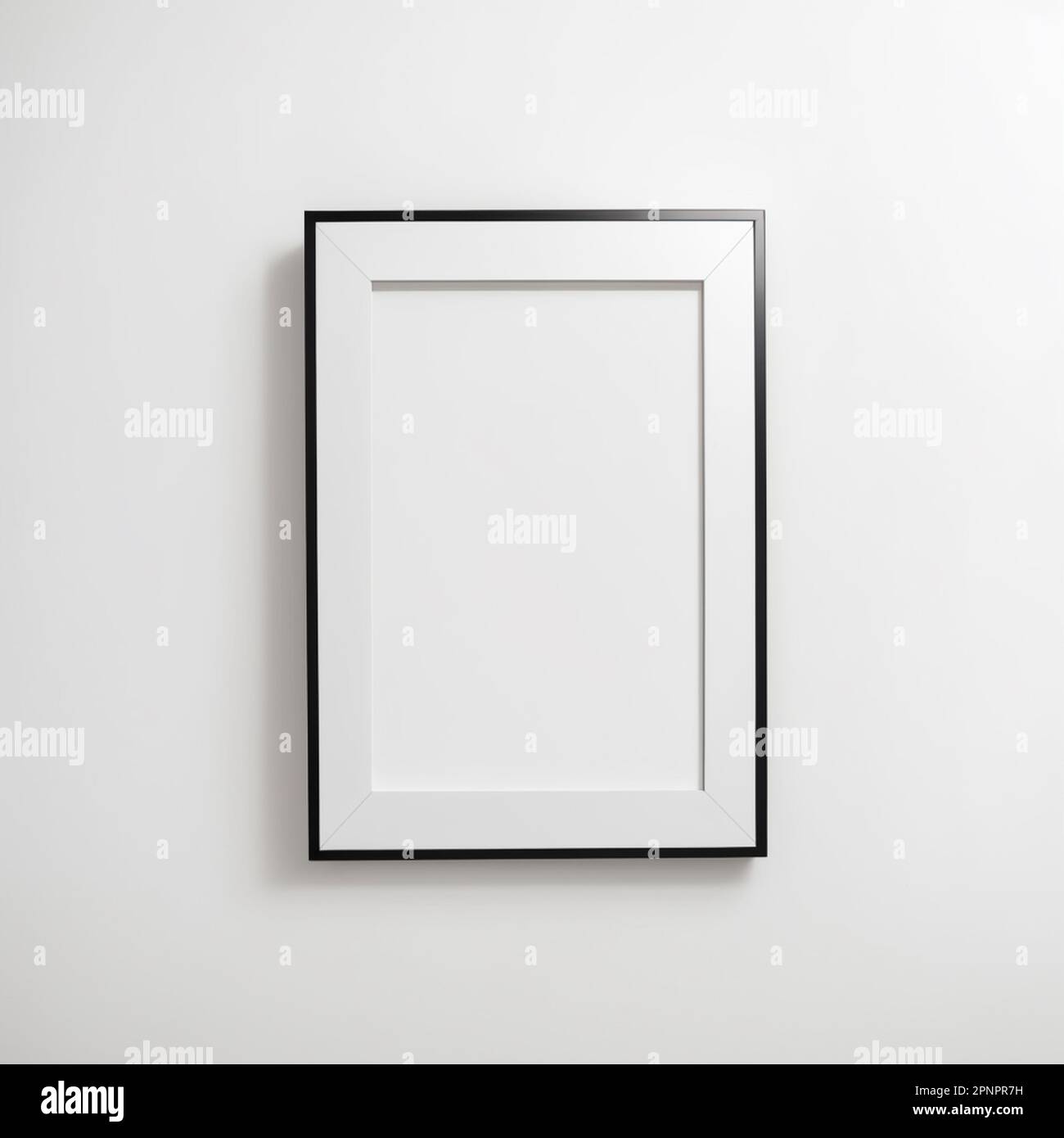 Black picture frame with rectangular vertical shape hanging on a white ...