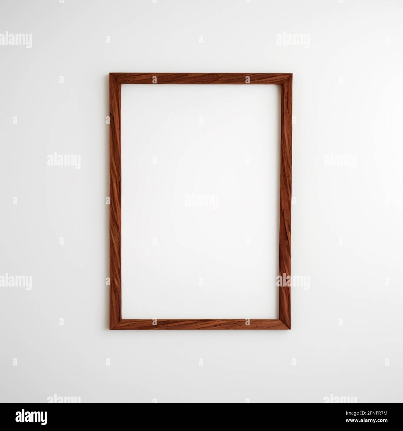 Wooden frame with rectangular vertical shape hanging on a white wall ...