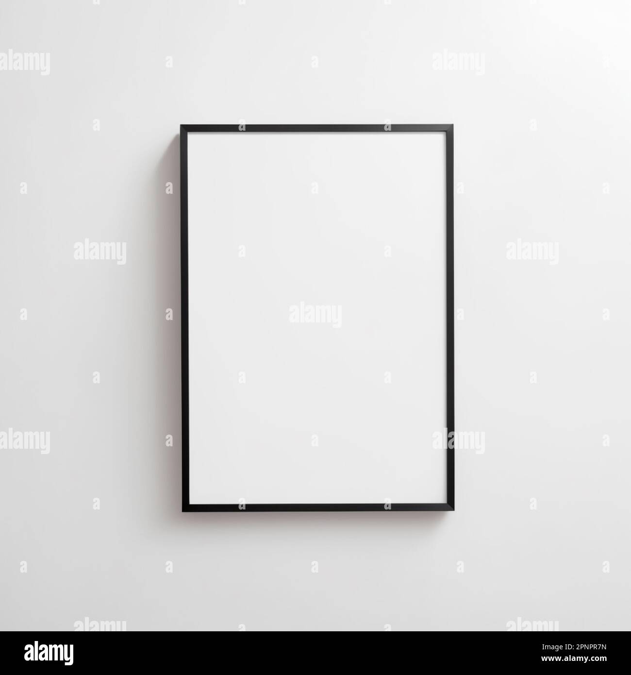 Black frame with rectangular vertical shape hanging on a white wall ...