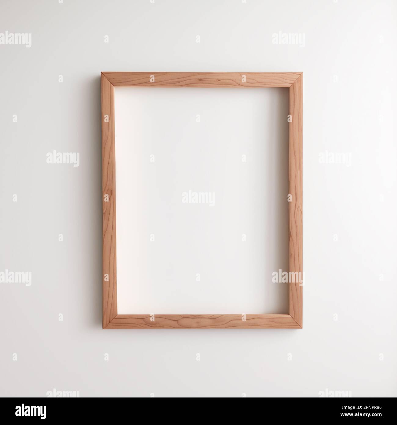 Old wooden picture frame with vertical shape hanging on a white wall ...