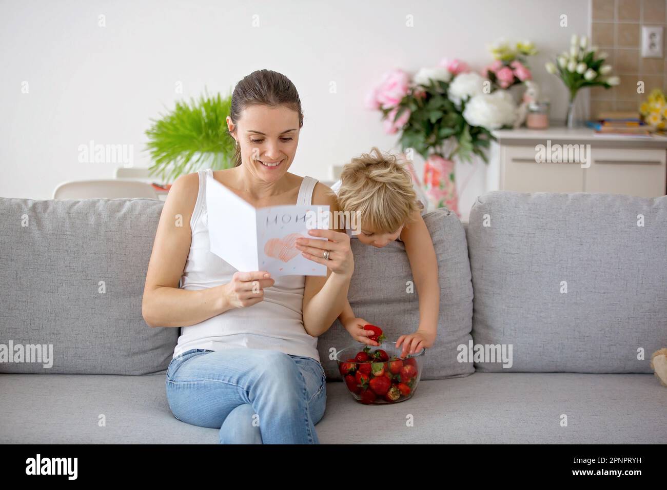 Cute toddler child, giving mom card with heart for Mothers day, mom ...