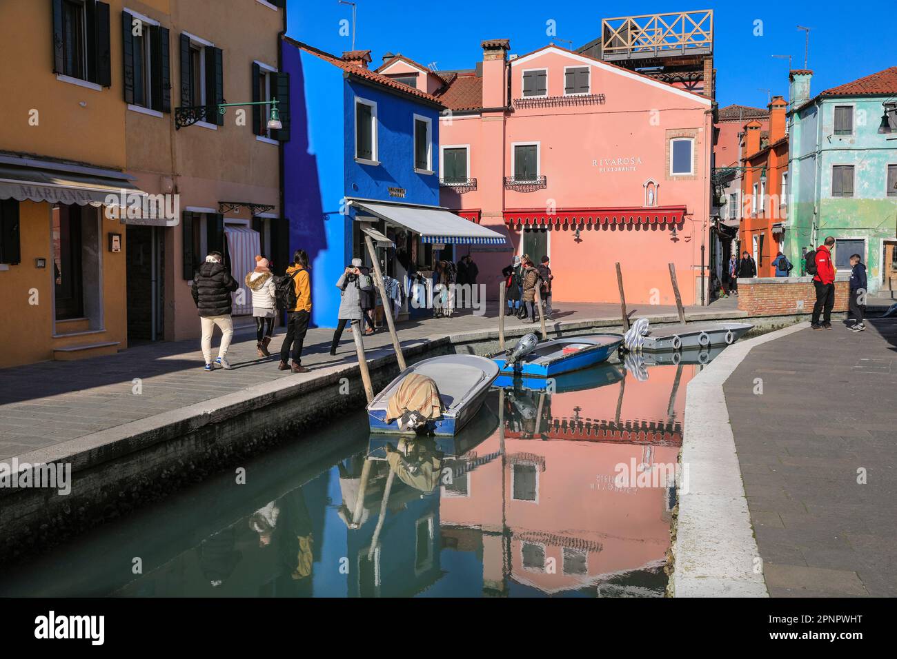 Burano island, colourful houses and reflections by the canal, Fondamenta Cavanella, Burano ...