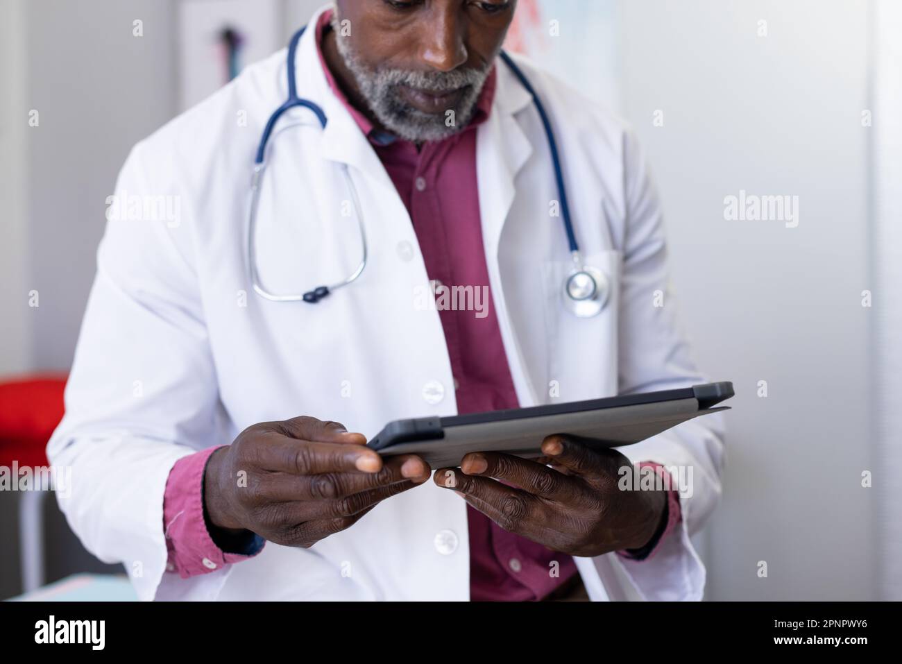 Stethoscope wearing medical professional using hi-res stock photography ...