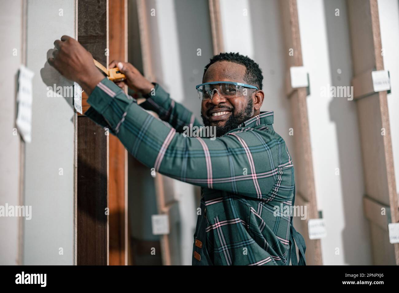 Carpenters get order via digital device , analyze blueprint, measure ...