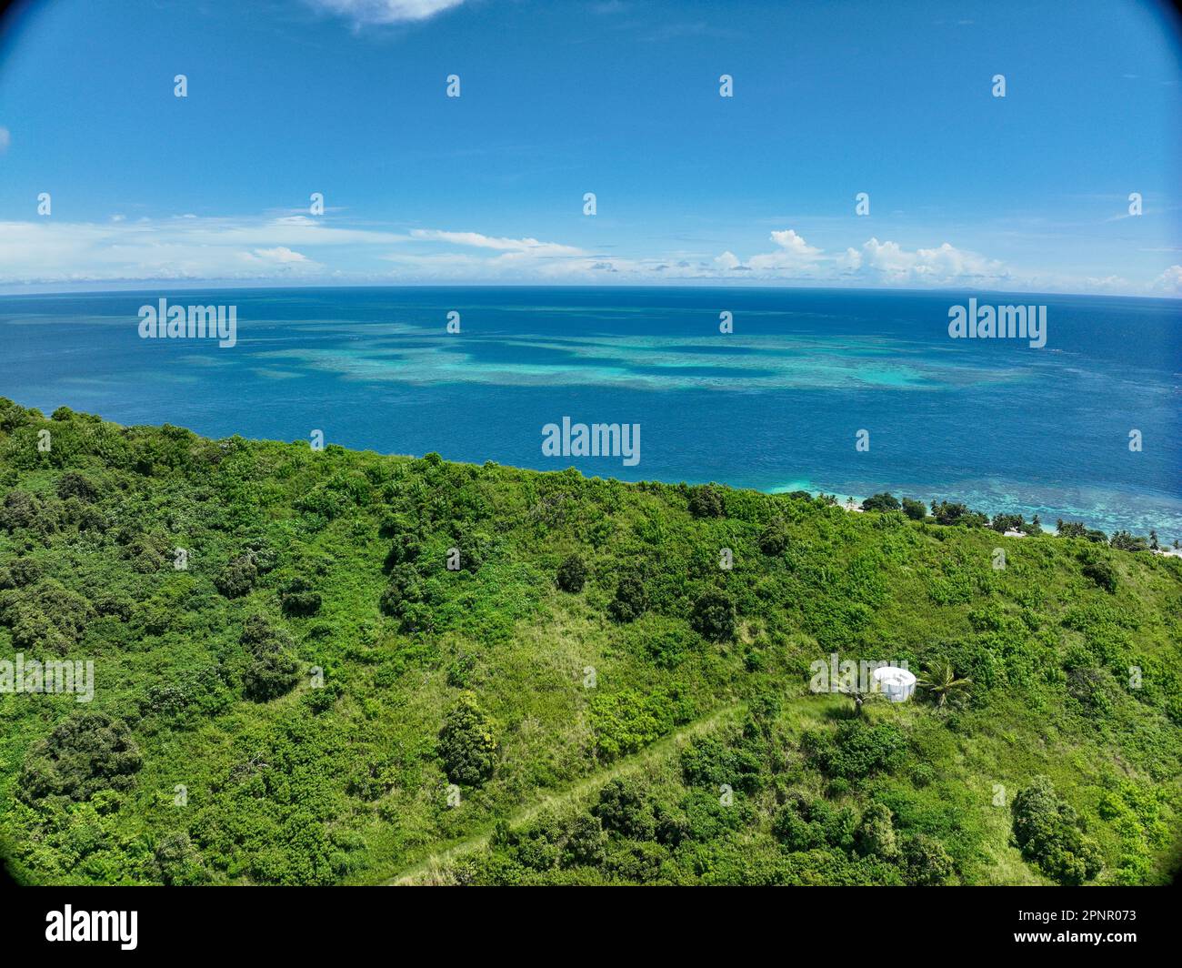 Aerial view of lush green tropical island in torres strait hi-res stock ...