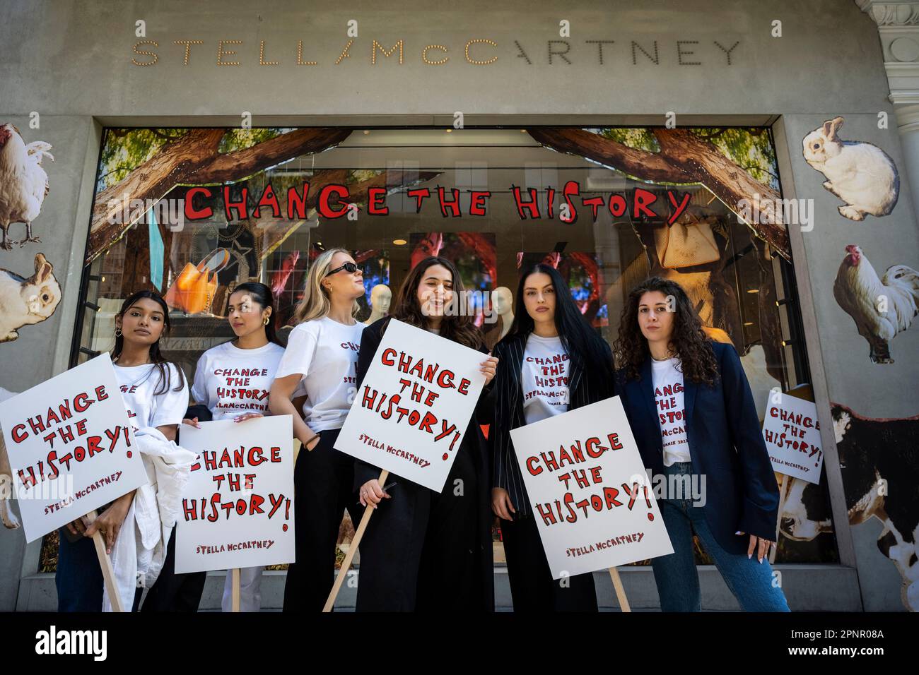 London, UK. 20 April 2023. Models, activists and staff with signs and T ...