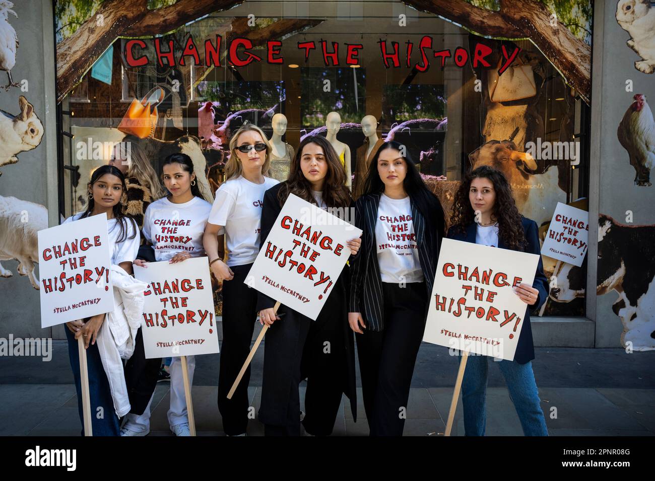 London, UK. 20 April 2023. Models, activists and staff with signs and T ...