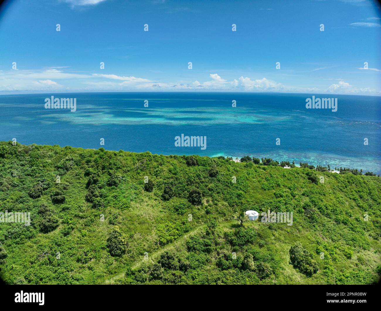 Aerial view of lush green tropical island in torres strait hi-res stock ...
