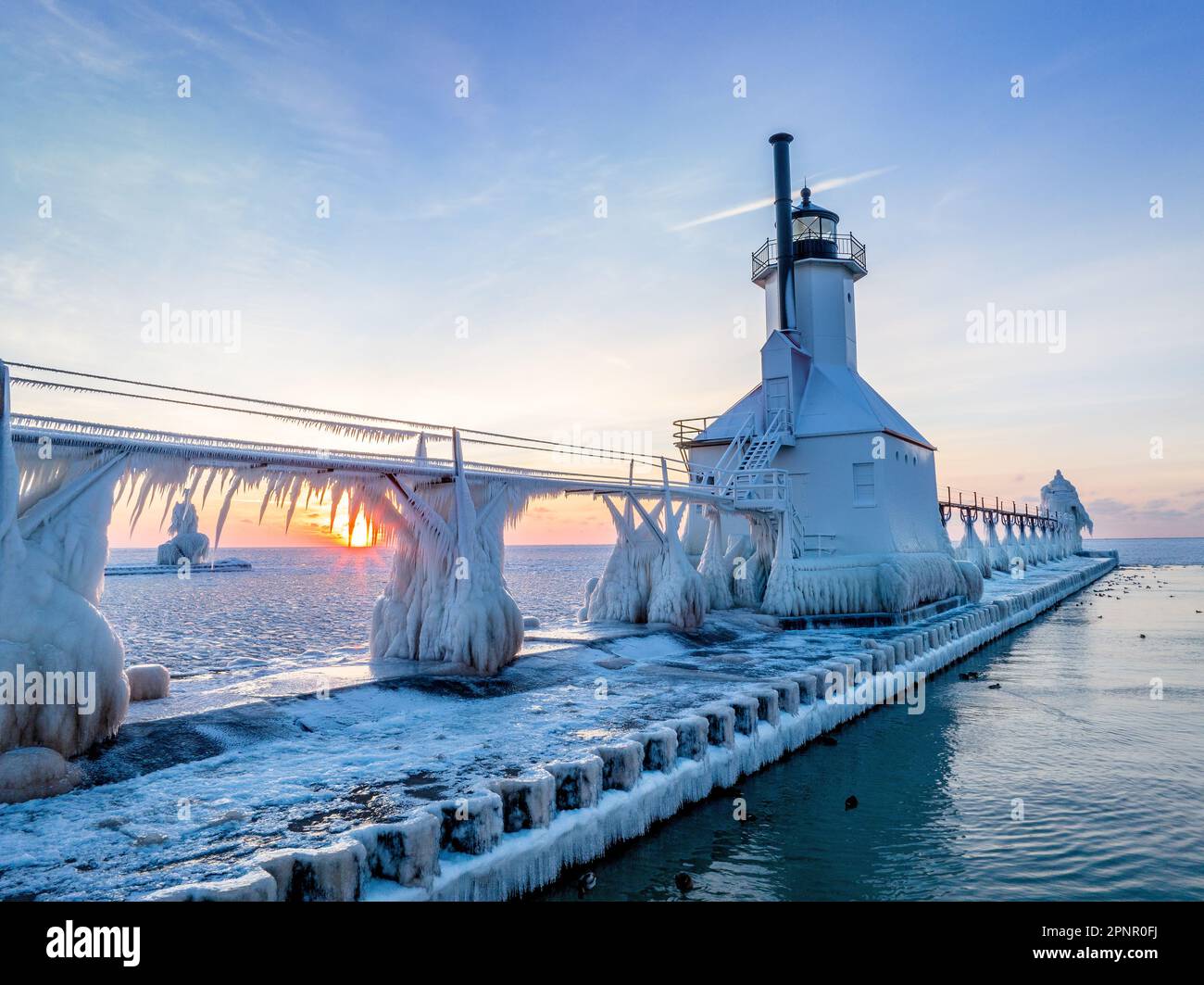 St Joseph North Pier Inner and Outer Lights lighthouses in winter, Lake ...