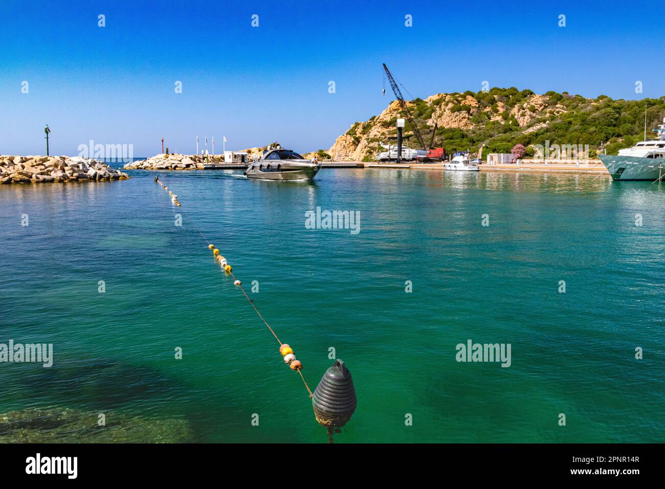 Luxury Motor Boat Entering the Marina dell'Orso di Poltu Quatu and ...