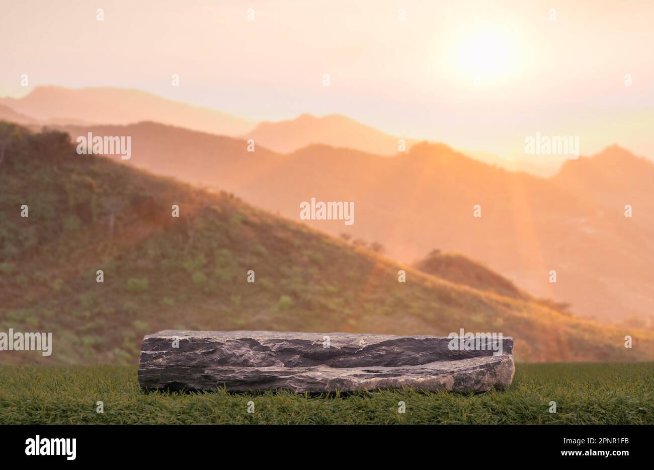 Stone podium outdoors on golden sky at sunset with mountain nature ...