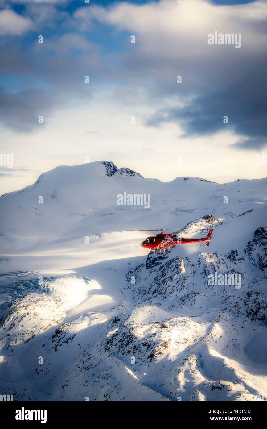 a red hun screwdriver in an icy dramatic mountain landscape Stock Photo ...