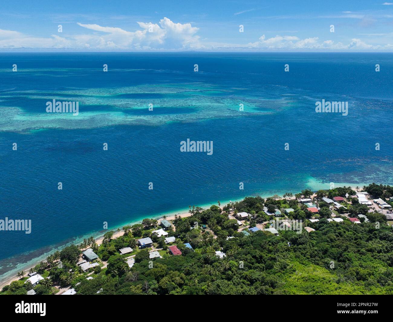 Aerial view of lush island showing tropical lving in the Torres Strait ...