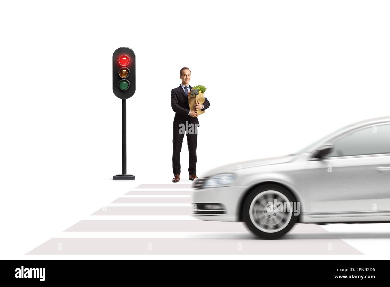 Full length portrait of a bussinesman holding a paper bag with ...