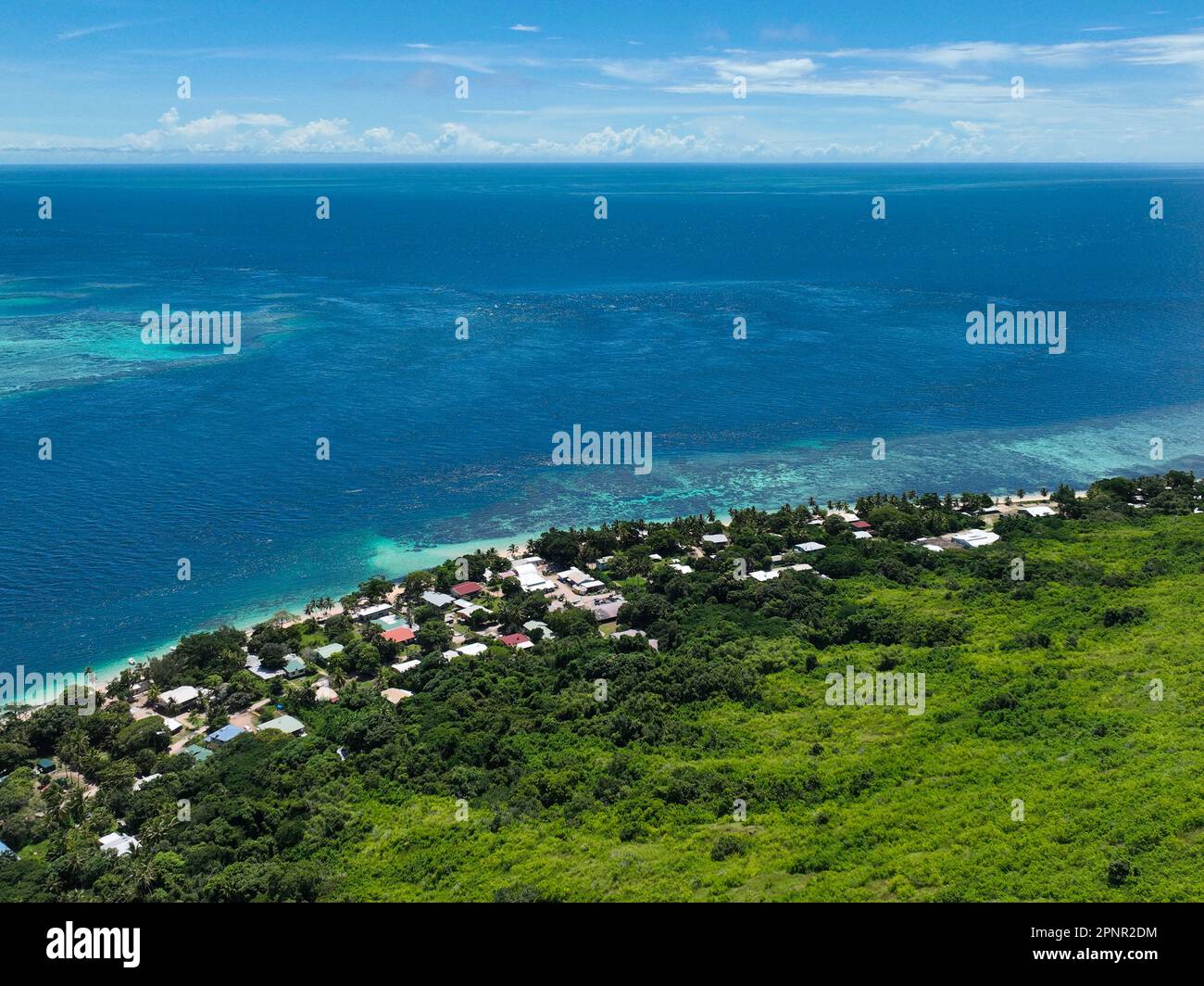 Aerial view of lush island showing tropical lving in the Torres Strait ...