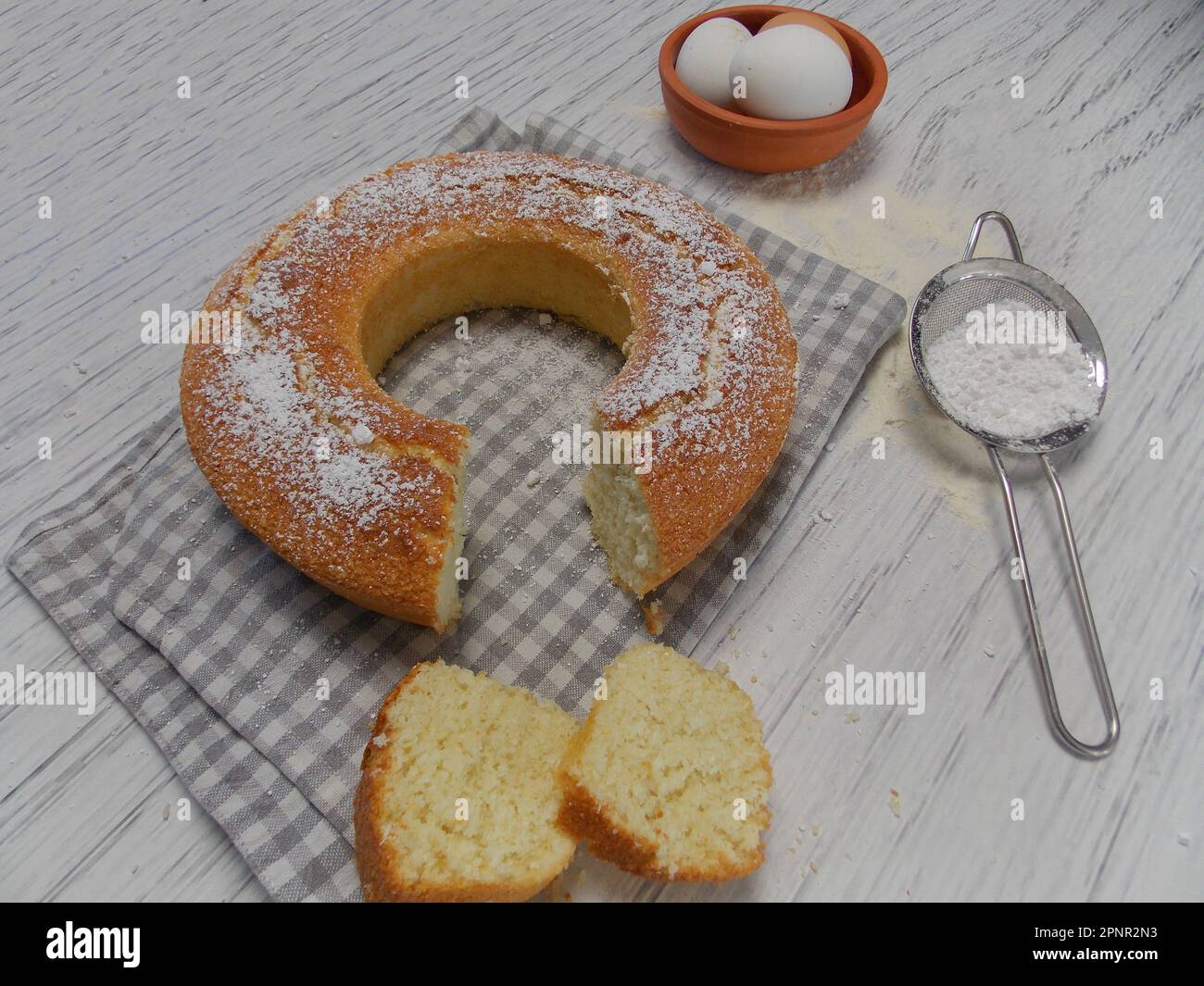 Homemade donut with coconut with eggs and flour, tupic Italian dessert ...