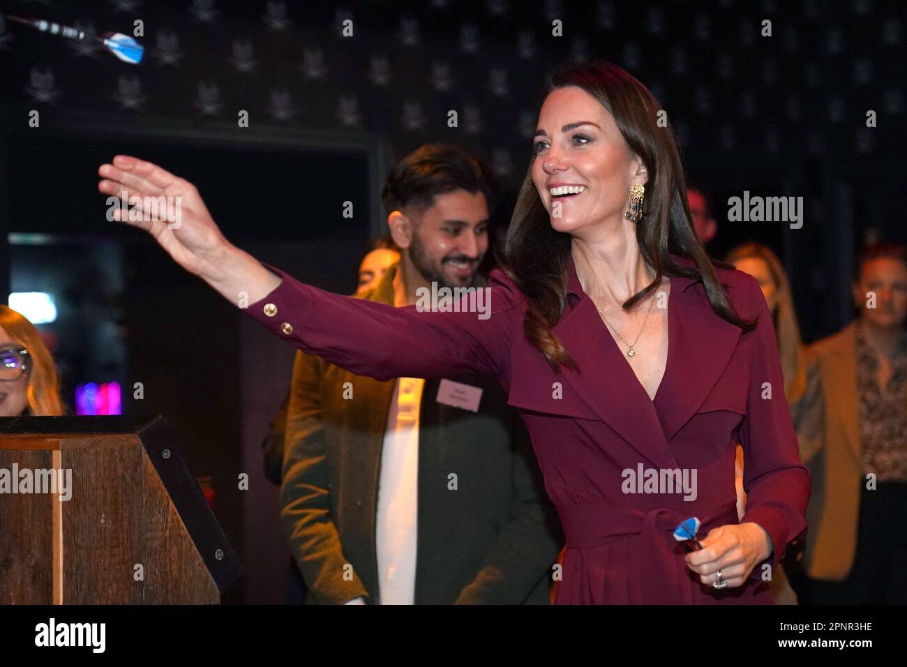 The Princess of Wales takes part in a game of interactive darts in the ...