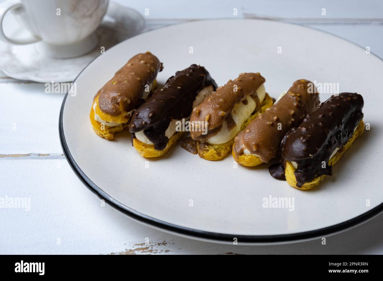 Traditional french chocolate eclair hi-res stock photography and images ...