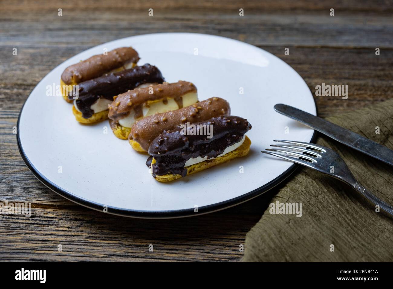 Chocolate eclairs, traditional French dessert, close-up Stock Photo - Alamy