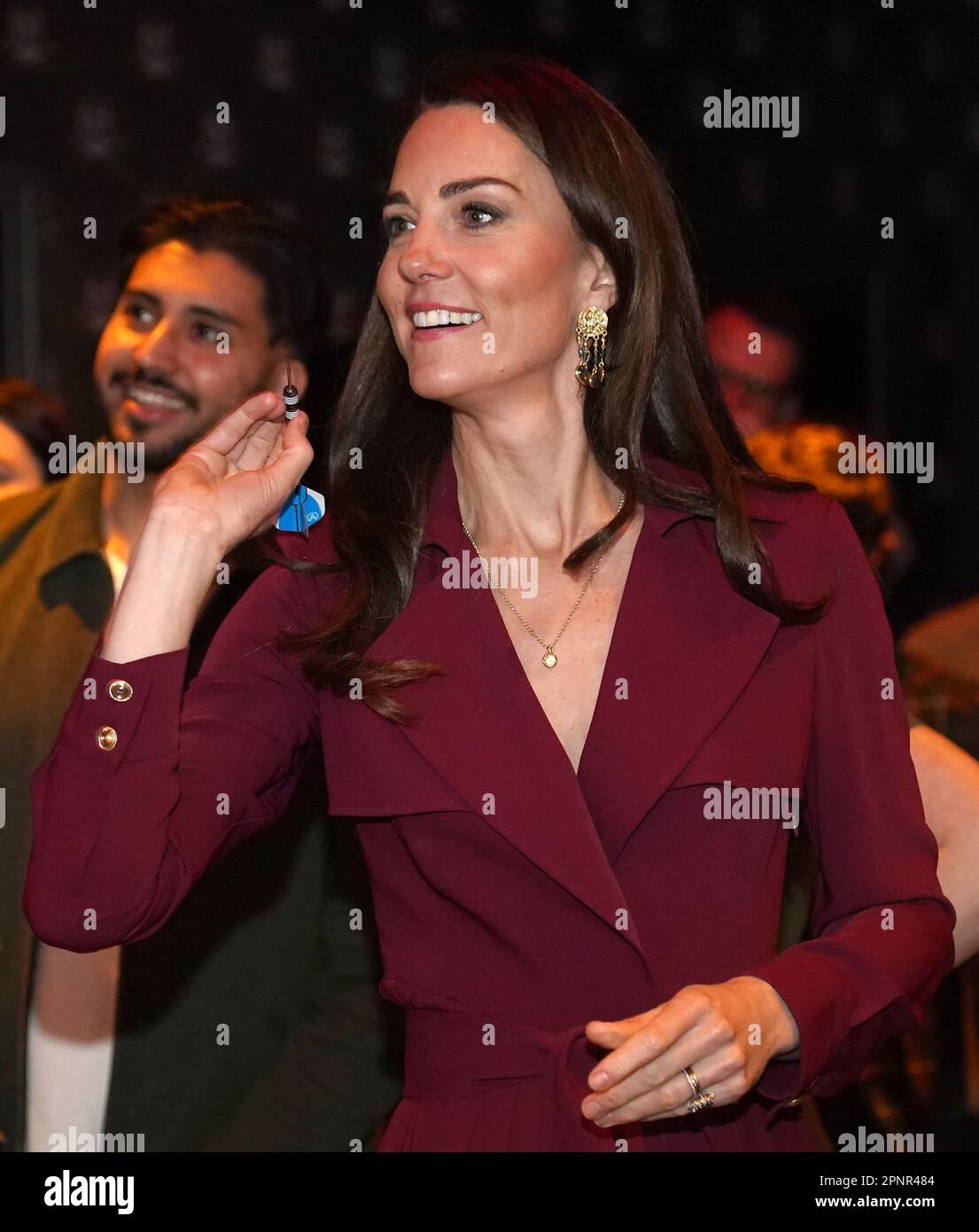 The Princess of Wales takes part in a game of interactive darts in the ...