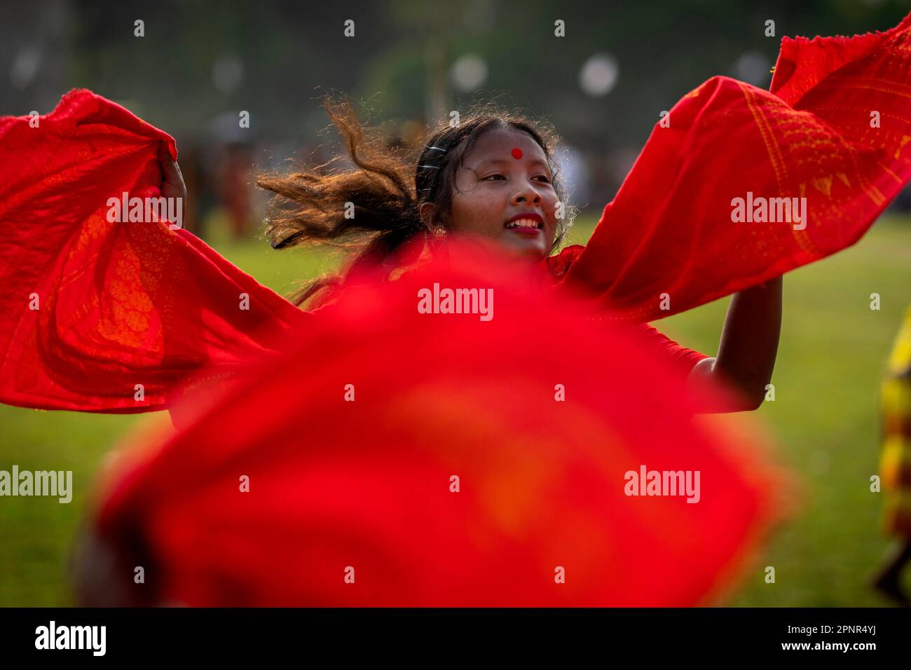 A Bodo tribal girl dances during Suwori festival in Boko, west of Guwahati, India, Thursday ...