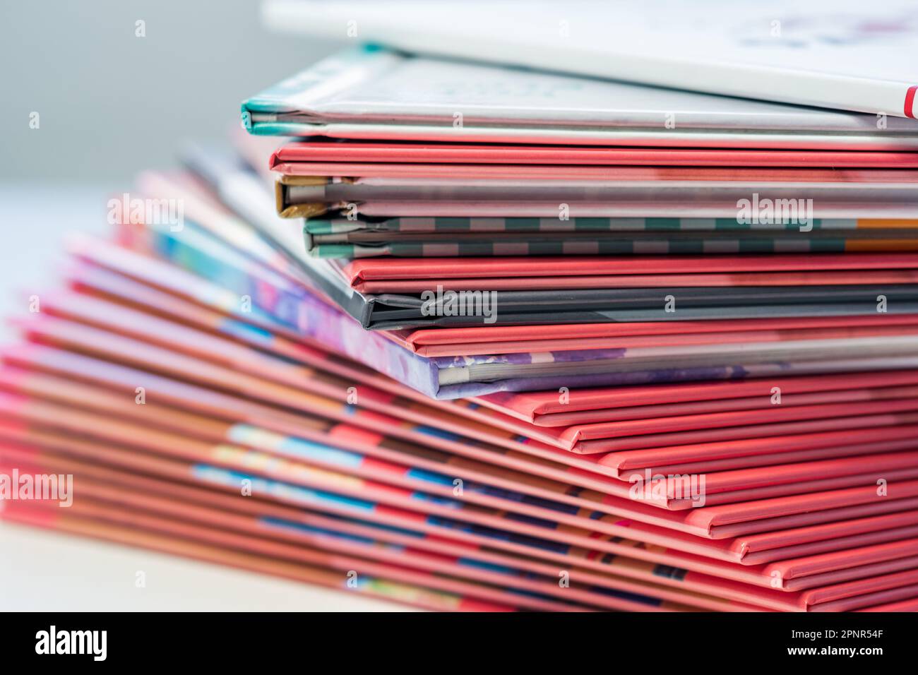 multi-colored spines of photo books close-up, partial blur Stock Photo ...