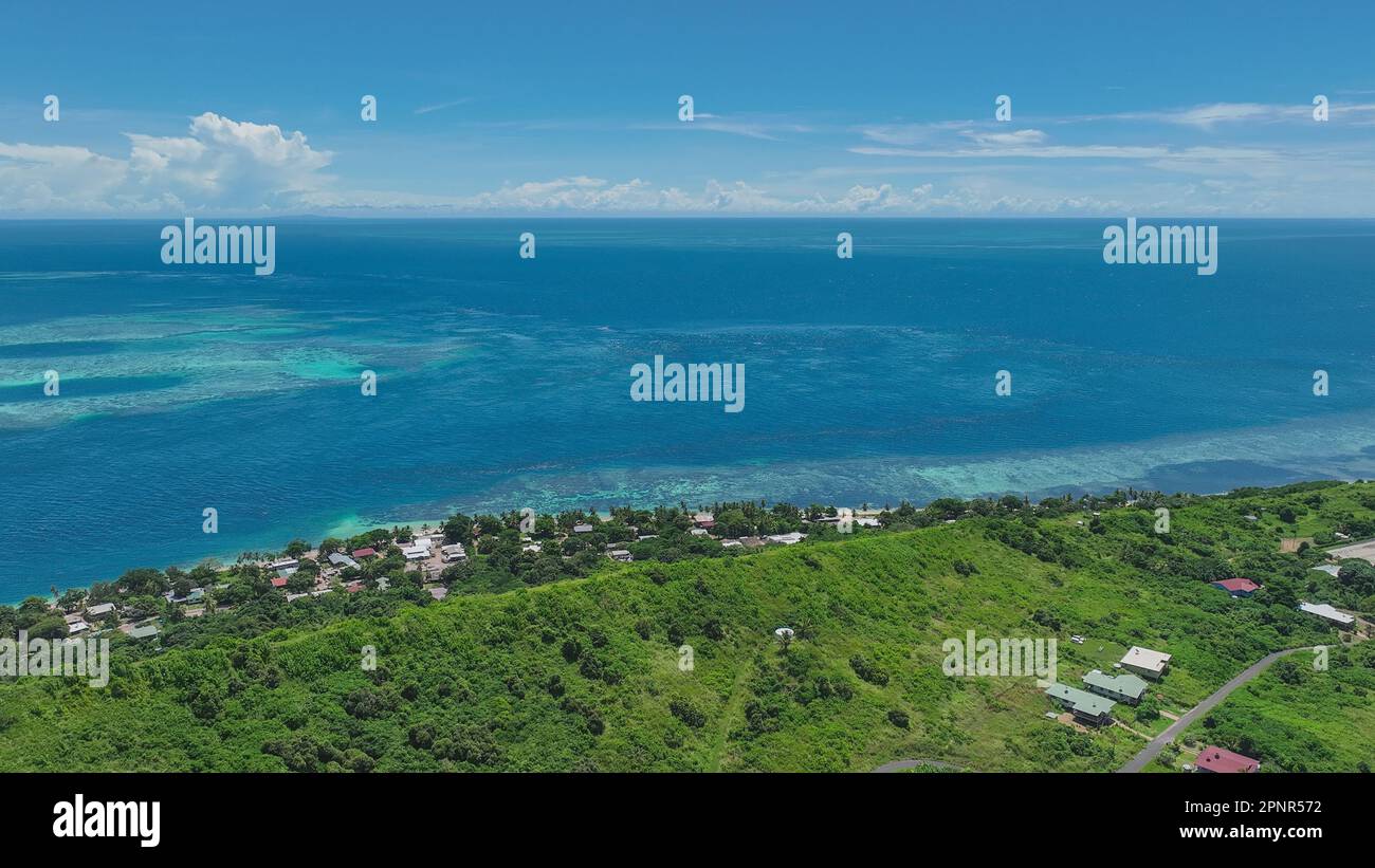 Aerial view of lush island showing tropical lving in the Torres Strait ...