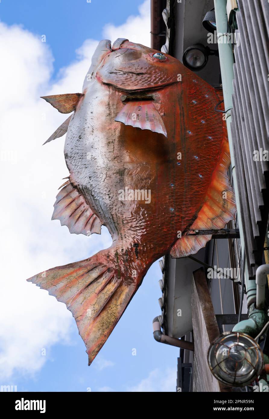 A fish statue over a shop entrance in Kinosaki, Hyogo Prefecture, Japan ...