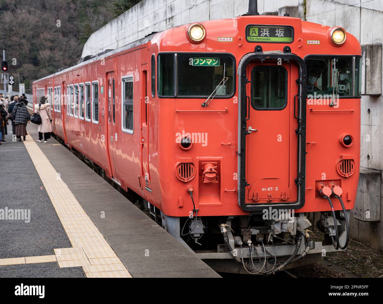 A JR West KiHa 47 Series train at Amarube Station on the Sanin Main ...