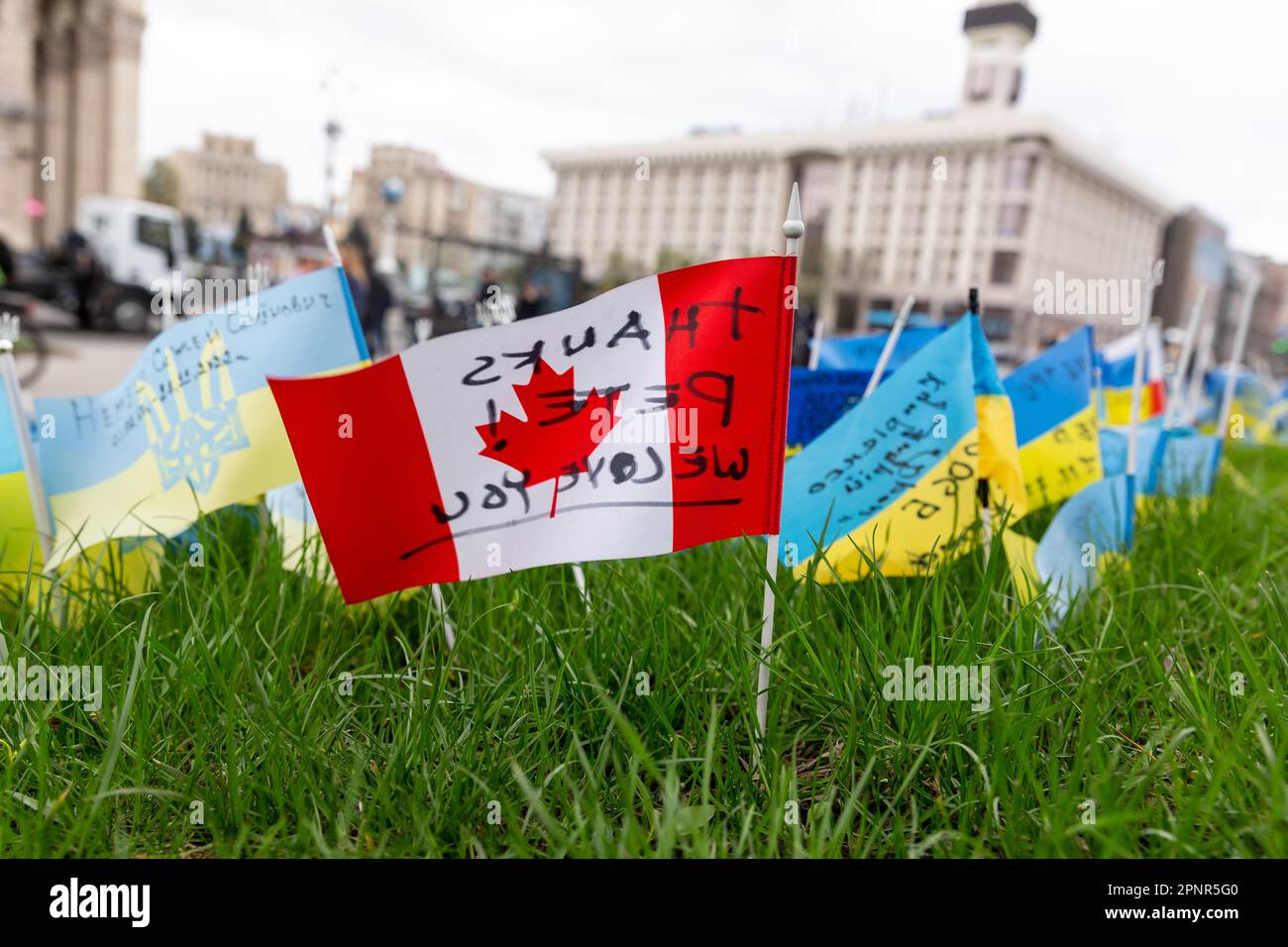 Kyiv, Ukraine. 20th Apr, 2023. Canadian flag is seen among blue and ...