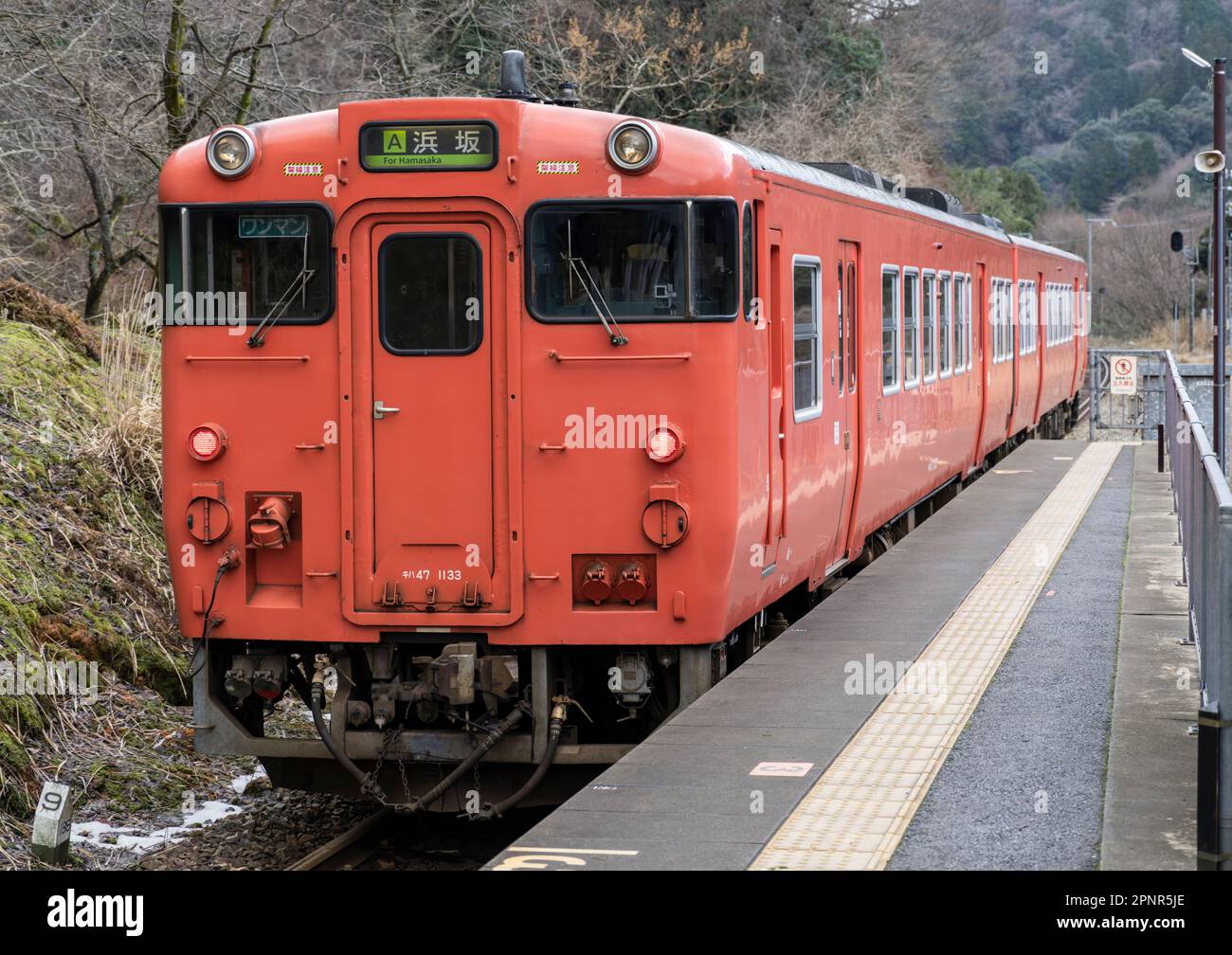 A JR West KiHa 47 Series train at Amarube Station on the Sanin Main ...