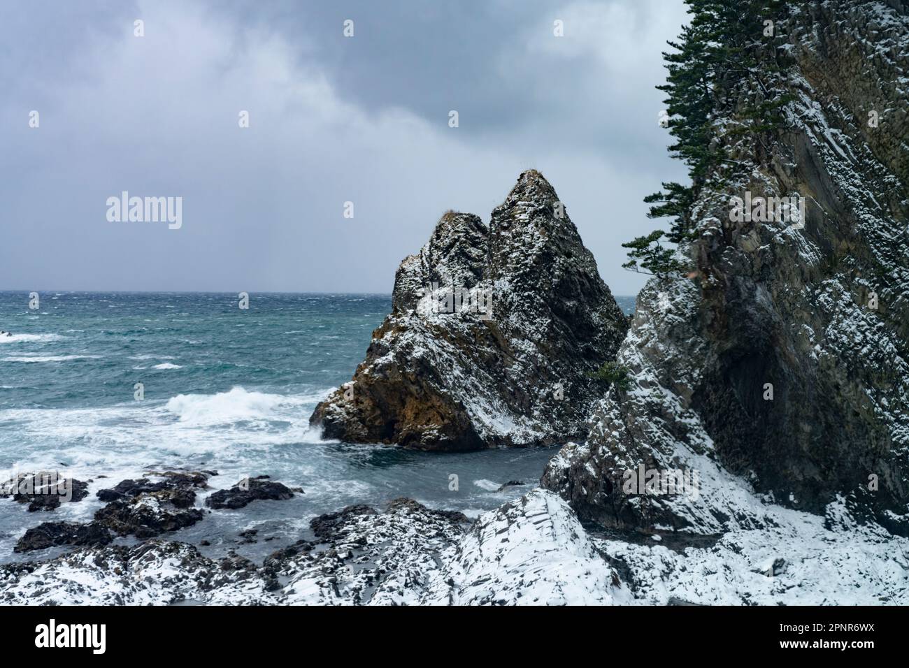 The rocky Sea of Japan coast in winter in Aomori Prefecture, seen from ...