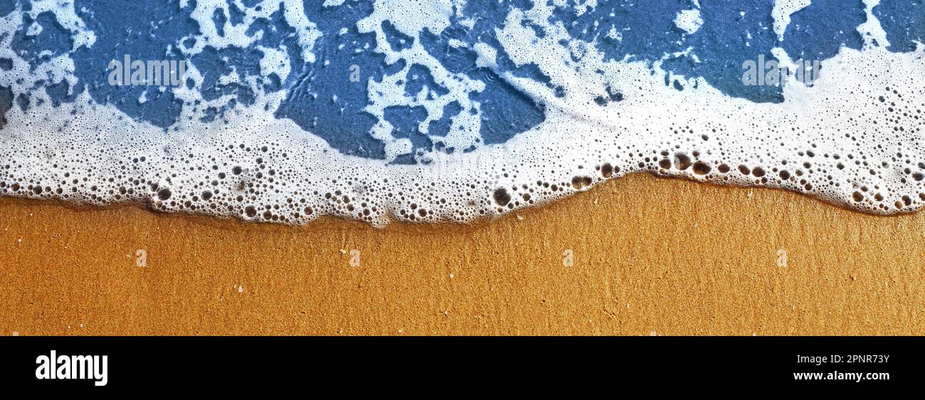 Soft sea wave with a foam on sand beach, text space. sea landscape ...