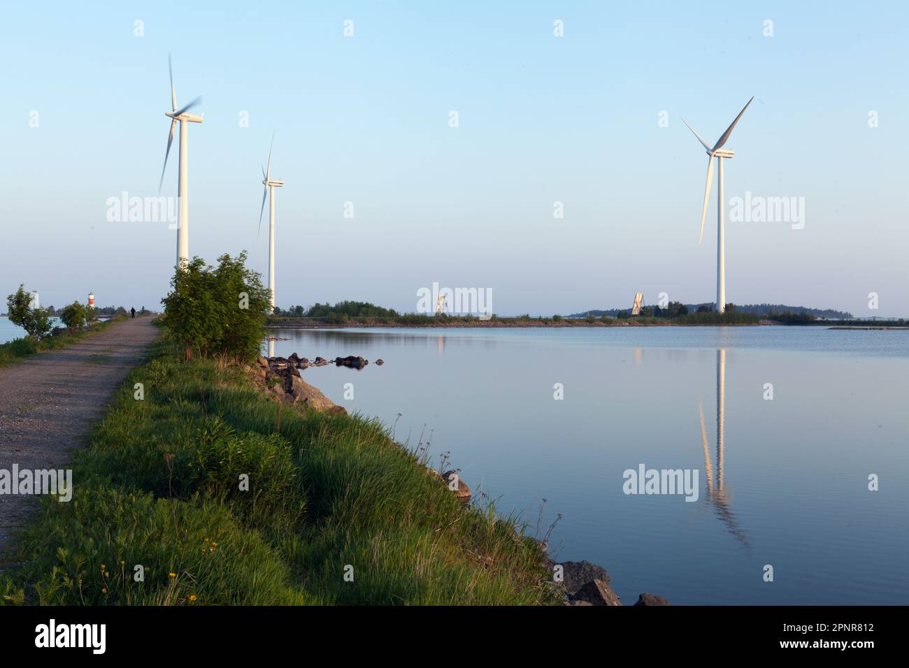 UMEA, SWEDEN ON JUNE 02, 2013. View of a wind power park, pylons, and a ...