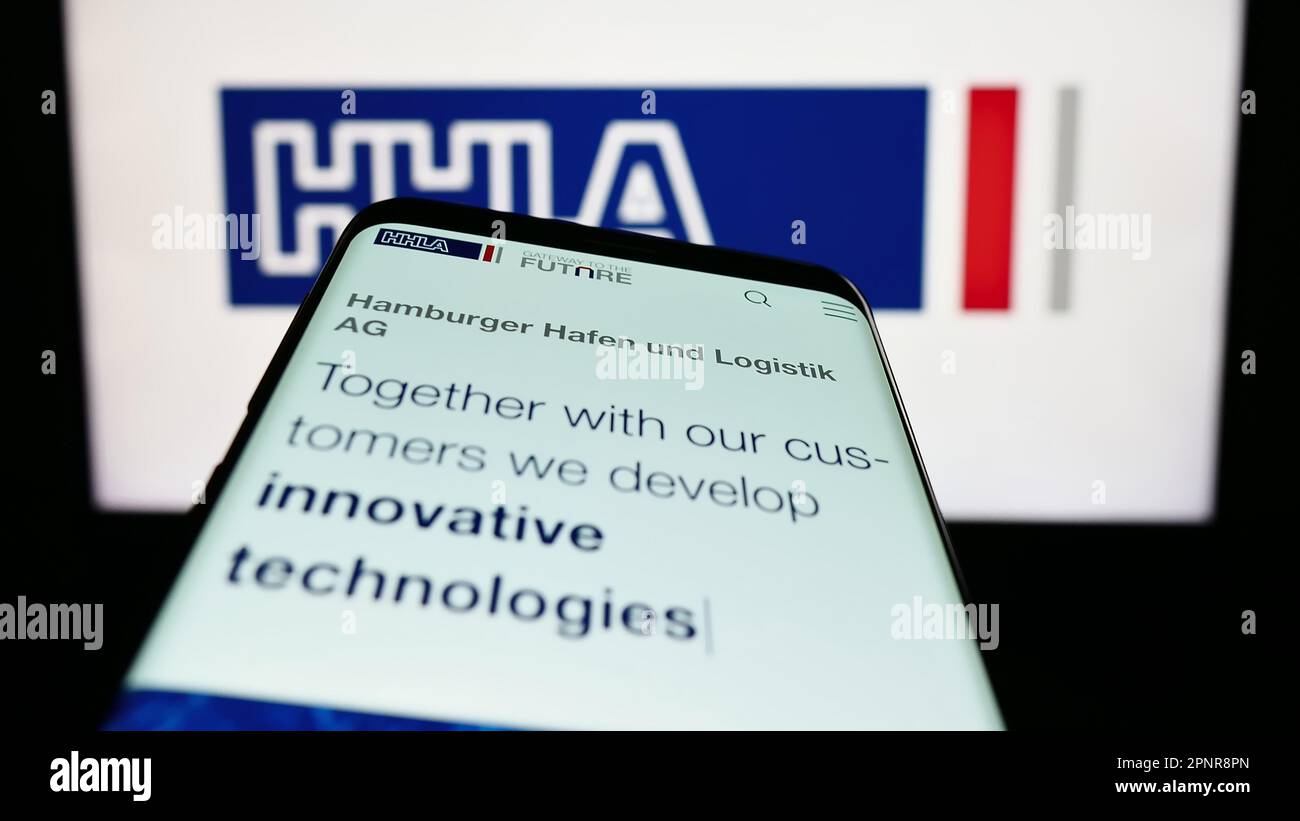 Mobile phone with website of company Hamburger Hafen und Logistik AG ...