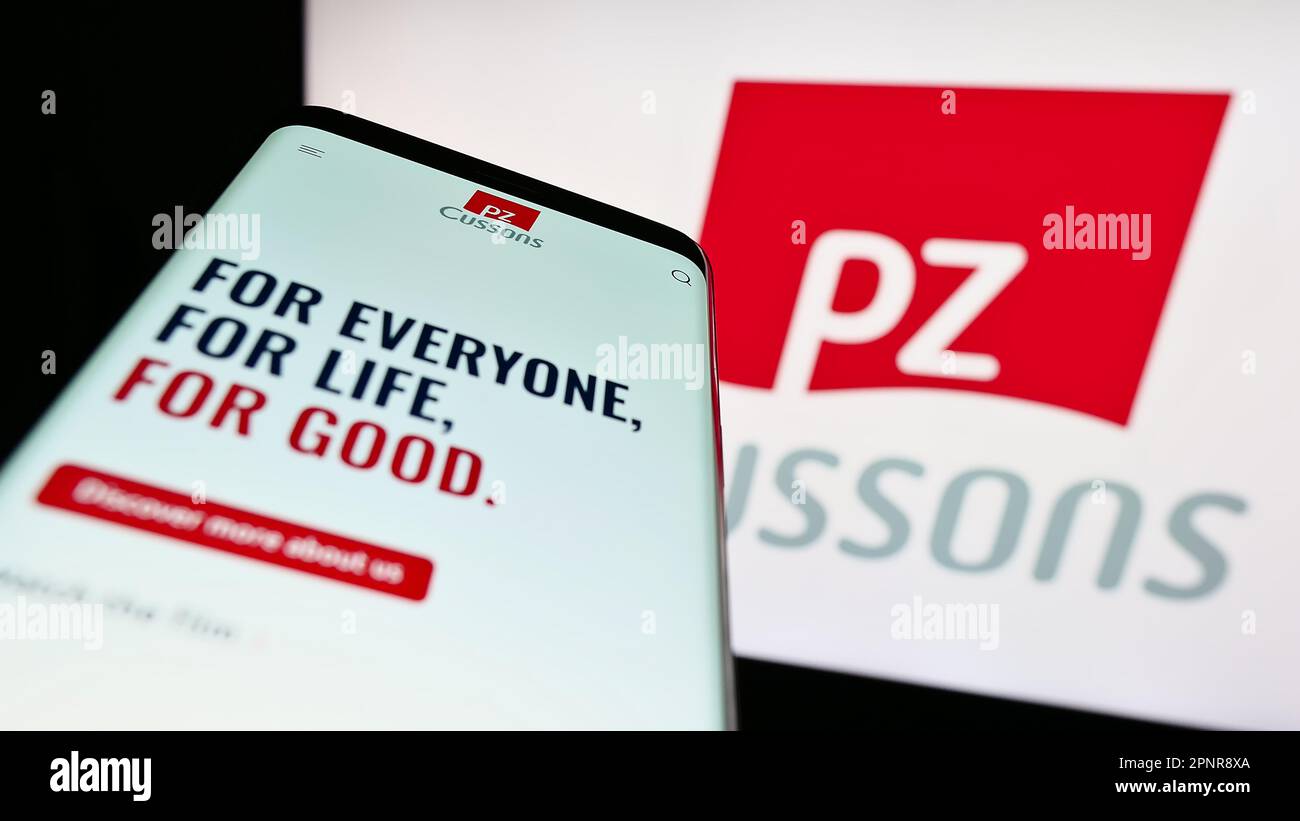 Mobile phone with website of British consumer goods company PZ Cussons ...