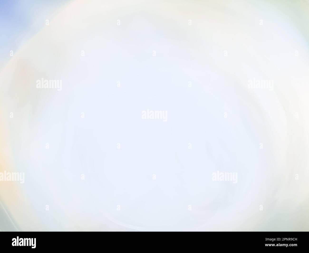 Opened book on white sheet with unreadable text blur defocus image ...