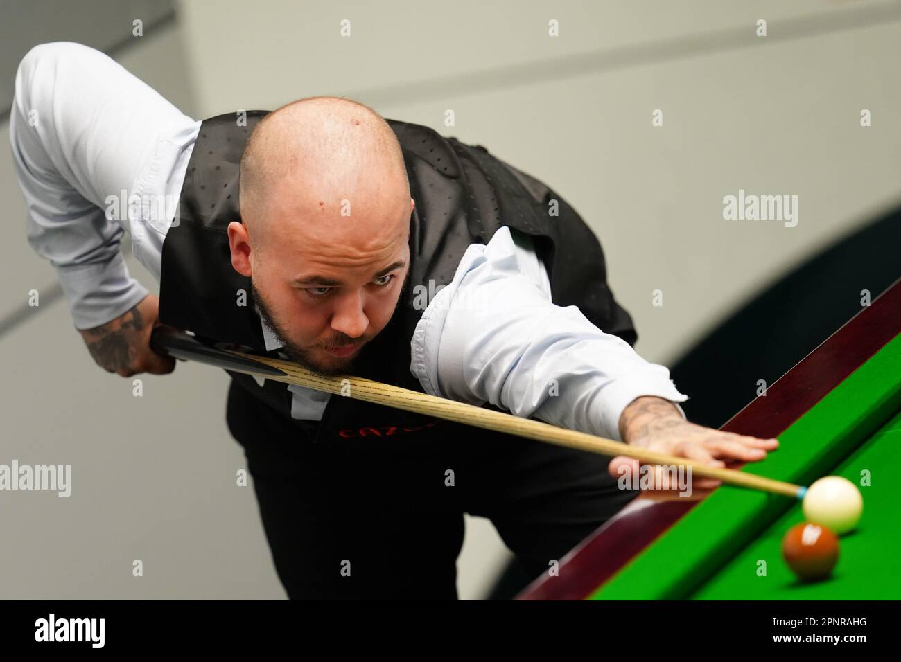 Luca Brecel in action against Mark Williams during day six of the Cazoo ...