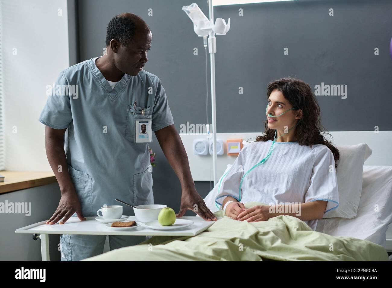African male nurse in hospital ward hi-res stock photography and images ...